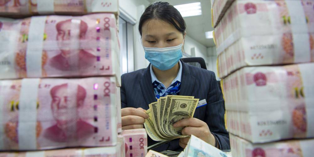China’s ‘renminbi trap’: The economy needs a weaker currency, but ...
